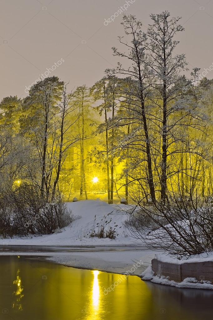 Winter river on the background of night city lights — Stock Photo ...