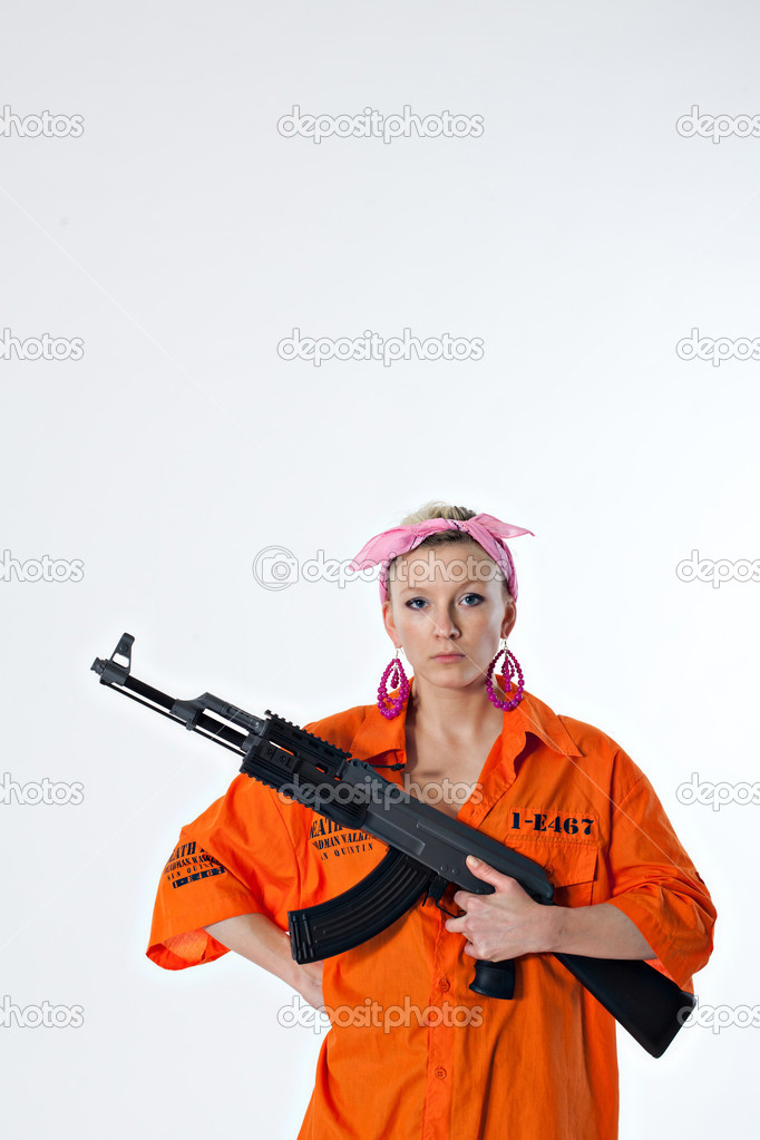 Young woman with automatic rifle — Stock Photo © adasv #16385903