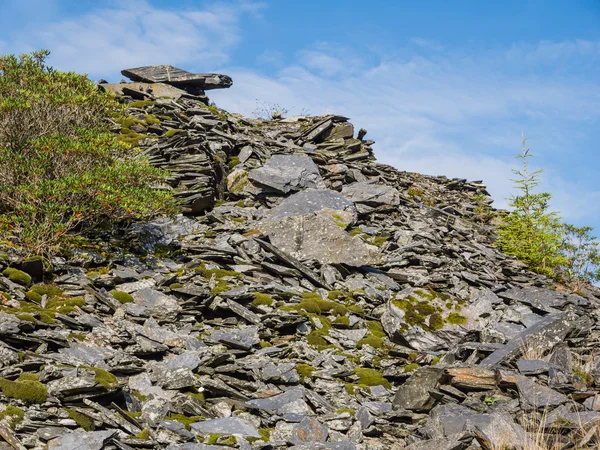 Slate waste heap from slate mine Stock Photo by ©Dolfilms 47942989