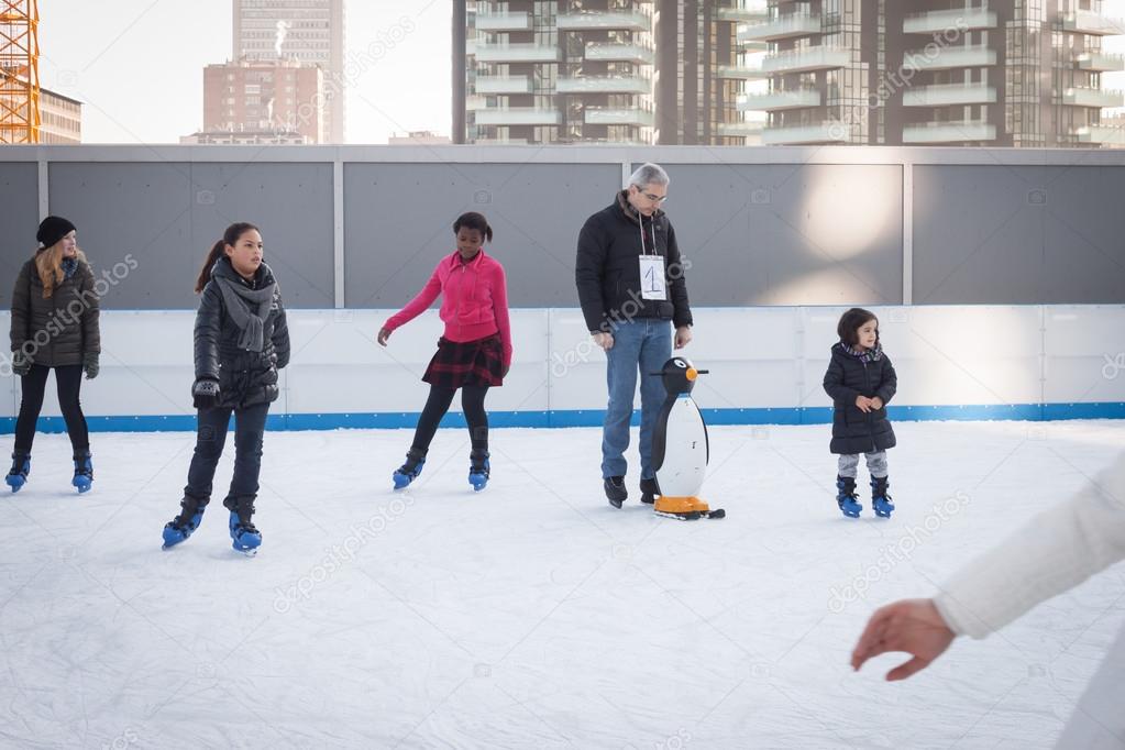 People skating on ice rink in Milan, Italy — Stock Editorial Photo ...