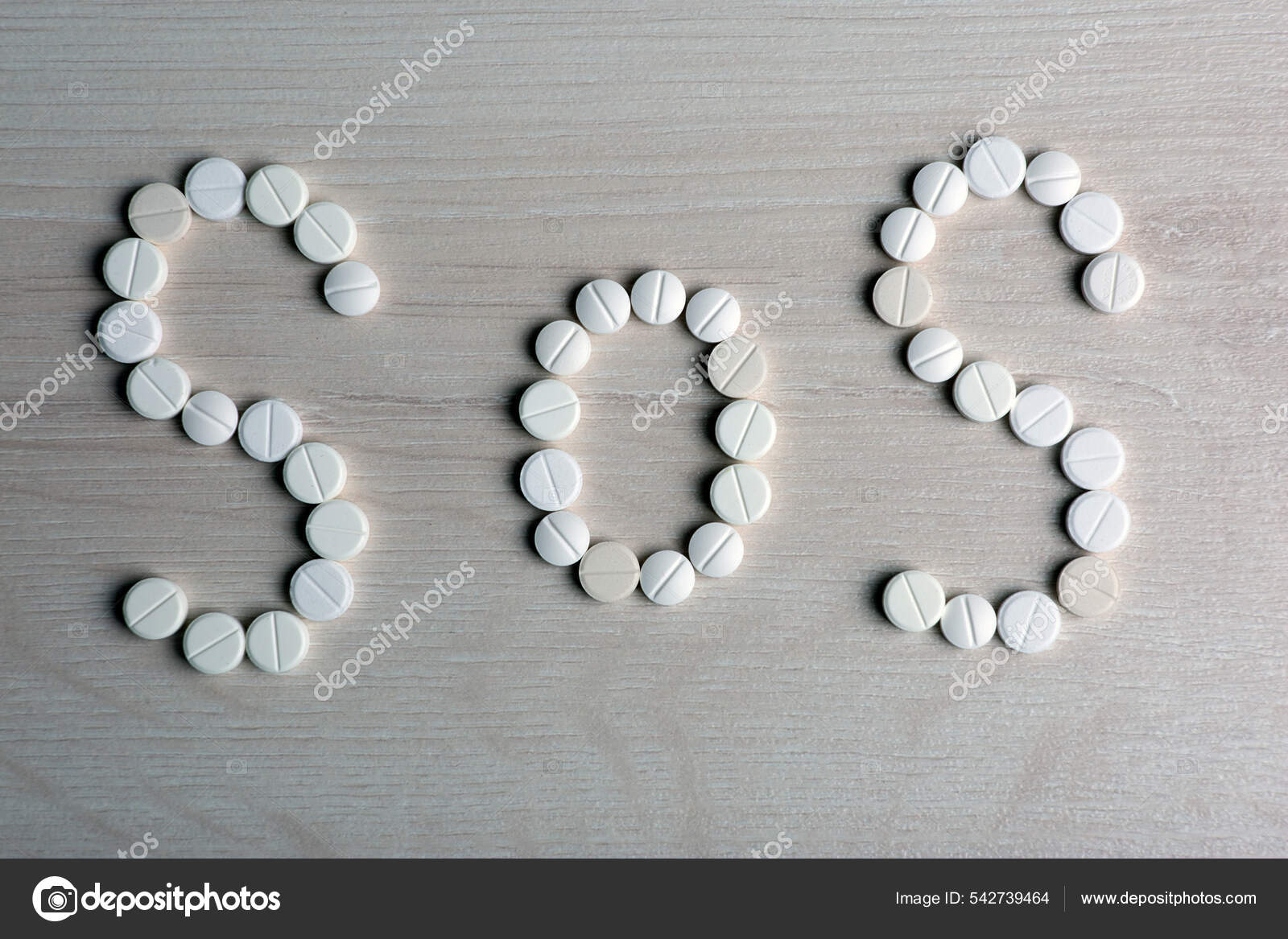 White Pills Laid Out Word Sos Table Top View — Stock Photo © mizar ...