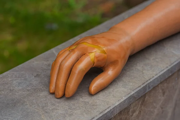 old artificial hand on the pavement of the city of istanbul. lost ...