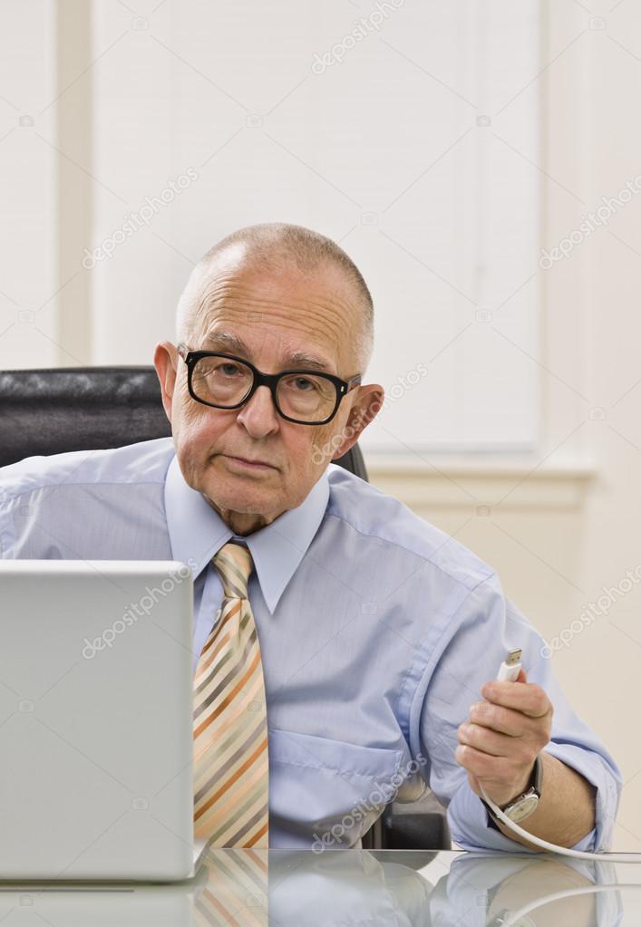 Man on Computer — Stock Photo © Spaces #18773591