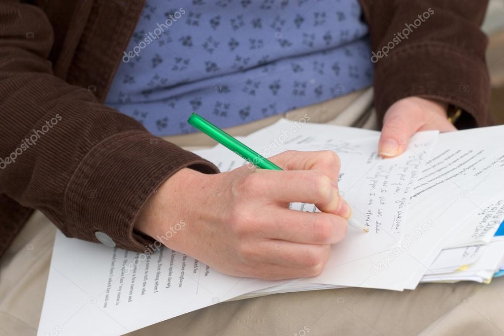 Woman Grading Papers Stock Photo by ©thepoeticimage 17839419