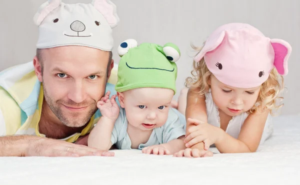 Happy dad with children Stock Photo by ©marchibas 29001165