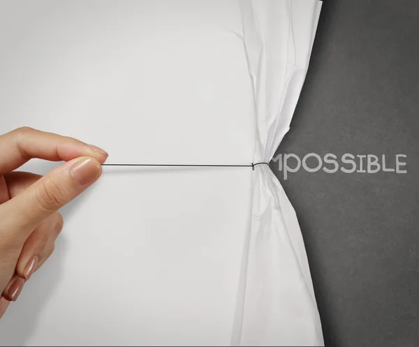 Hand pull wrinkled paper show think outside the box with crumple Stock ...