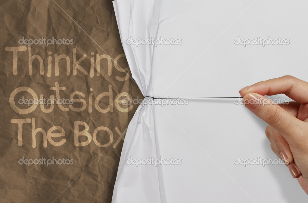 Hand pull wrinkled paper show think outside the box with crumple Stock ...