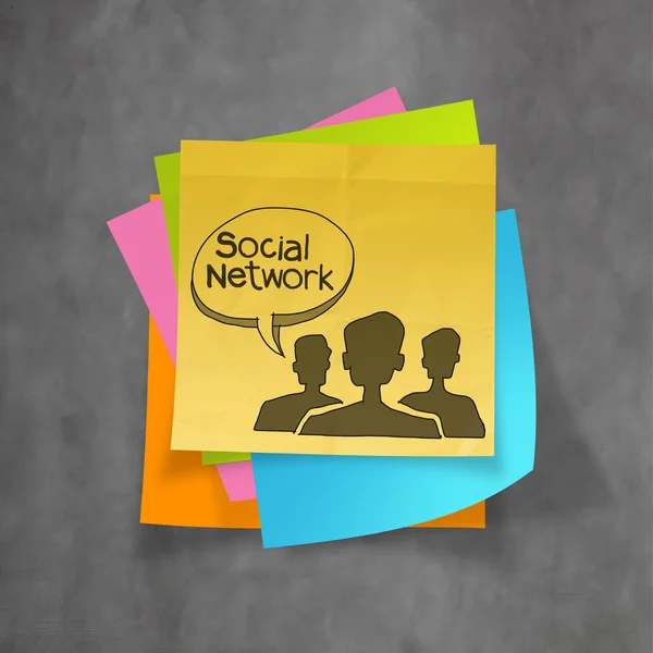 Sticky note with hand drawn social network icon on texture background ...