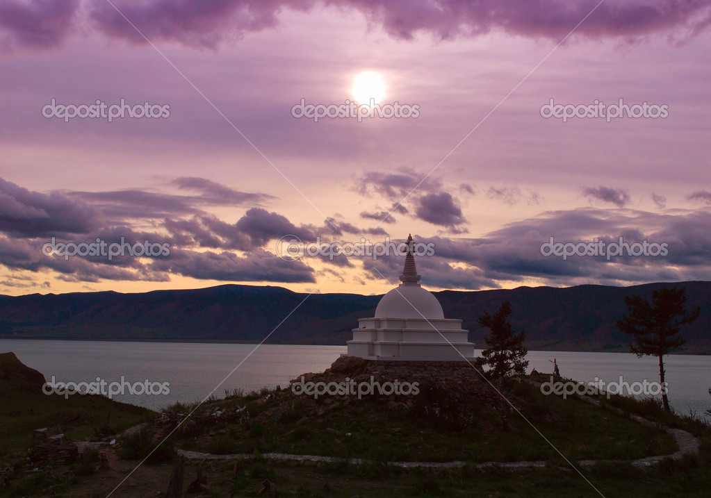 Stupa Enlightenments in a moonlight on lake Baikal — Stock Photo © OlVikA #35905193