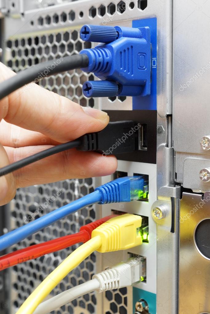 Technician is connecting device to a server — Stock Photo © bacho123456 ...