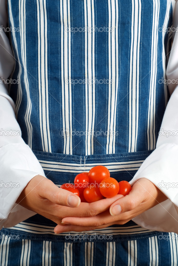 Woman chef with tomatoes — Stock Photo © alistairjcotton #18229917