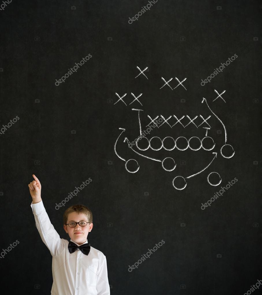 Hand up answer boy business man with chalk American football strategy ...