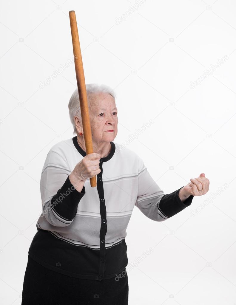 Old angry woman threatening with a rolling pin — Stock Photo © VBaleha ... Old angry woman threatening with a rolling pin — Stock Photo © VBaleha ...