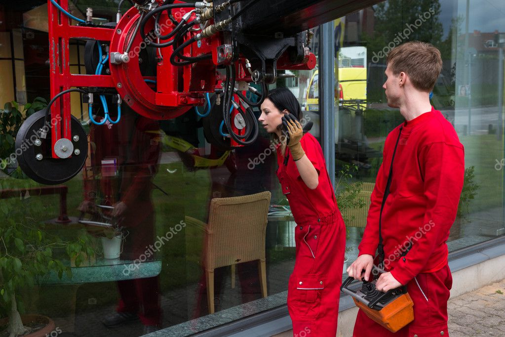 Glazier operating glass installation crane Stock Photo by ©Ikonoklast ...