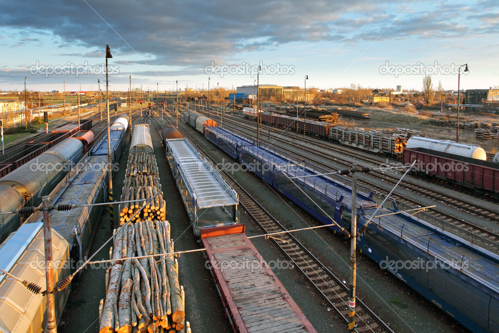 Freight Station with trains at sunset — Stock Photo © TTstudio #29721325