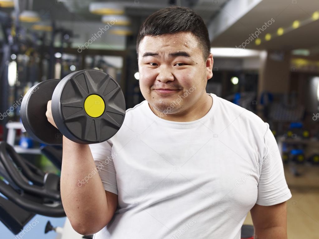 Overweight man exercising Stock Photo by ©imtmphoto 36928803