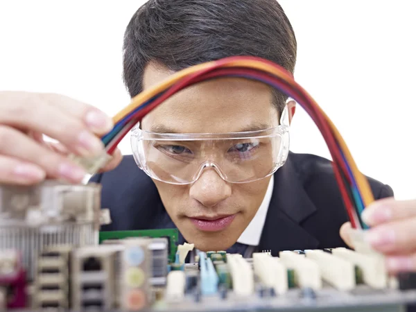 Man fixing computer Stock Photos, Royalty Free Man fixing computer ...