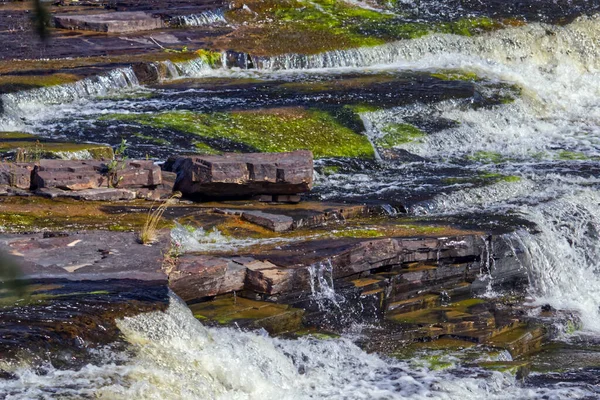 Moss and steps in rocks add to the beauty of the falls - Kakabeka Falls ...