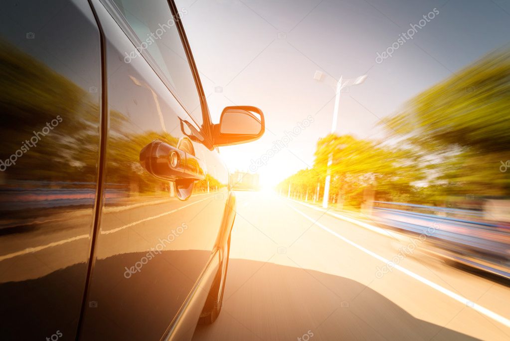A car driving on a motorway at high speeds Stock Photo by ©gjp1991 32624799