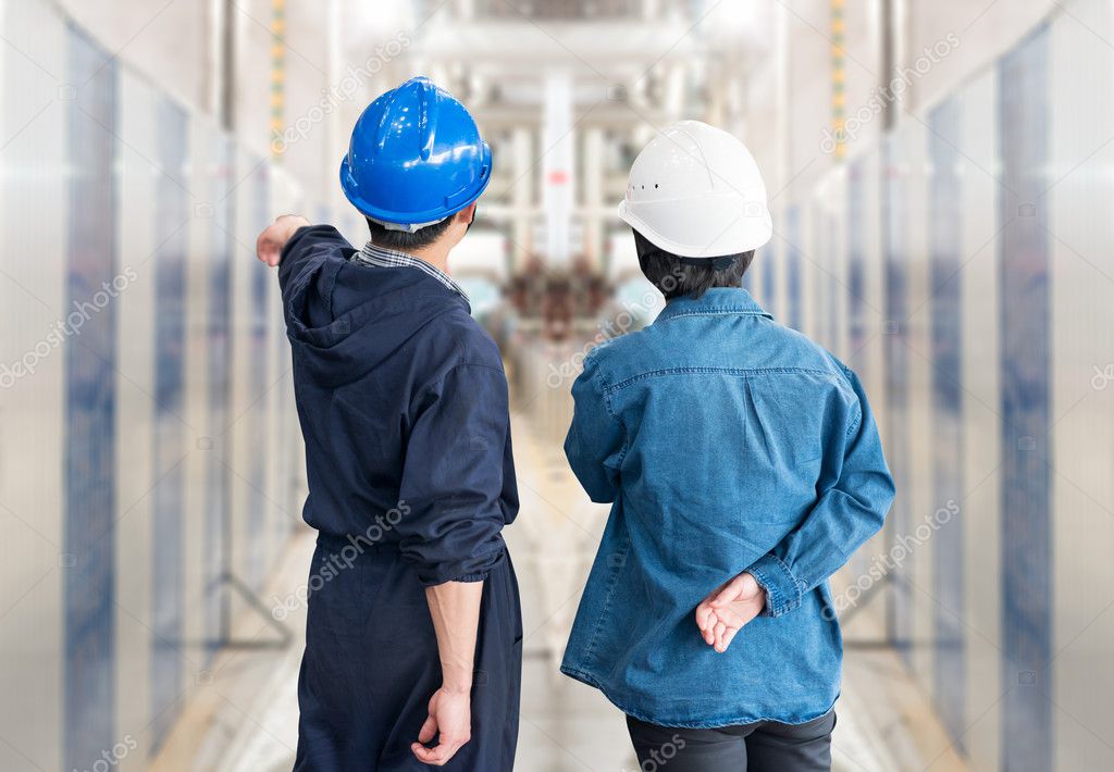 Construction workers at work place Stock Photo by ©gjp1991 51707783