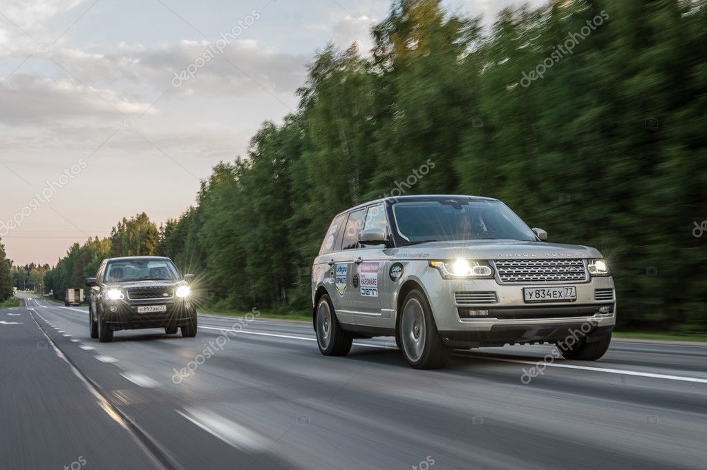 Suv cars on a road – Stock Editorial Photo © sergeydolya #26944675