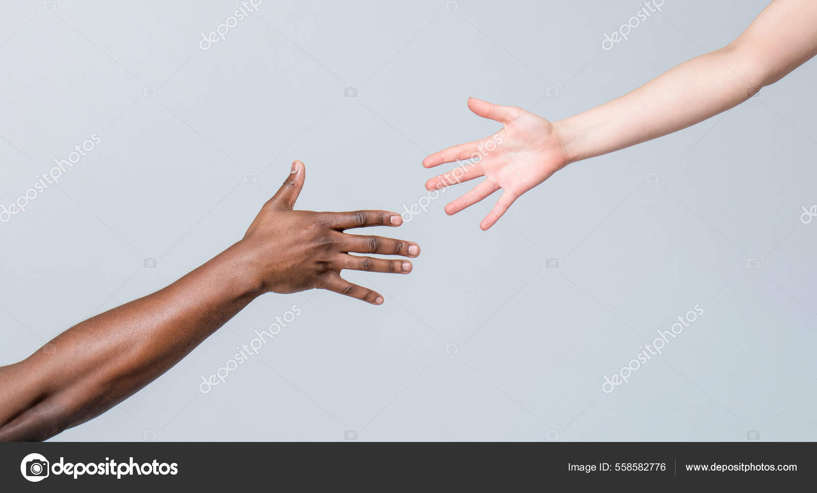 Giving a helping hand to another. Woman and african woman hand. Helping ...