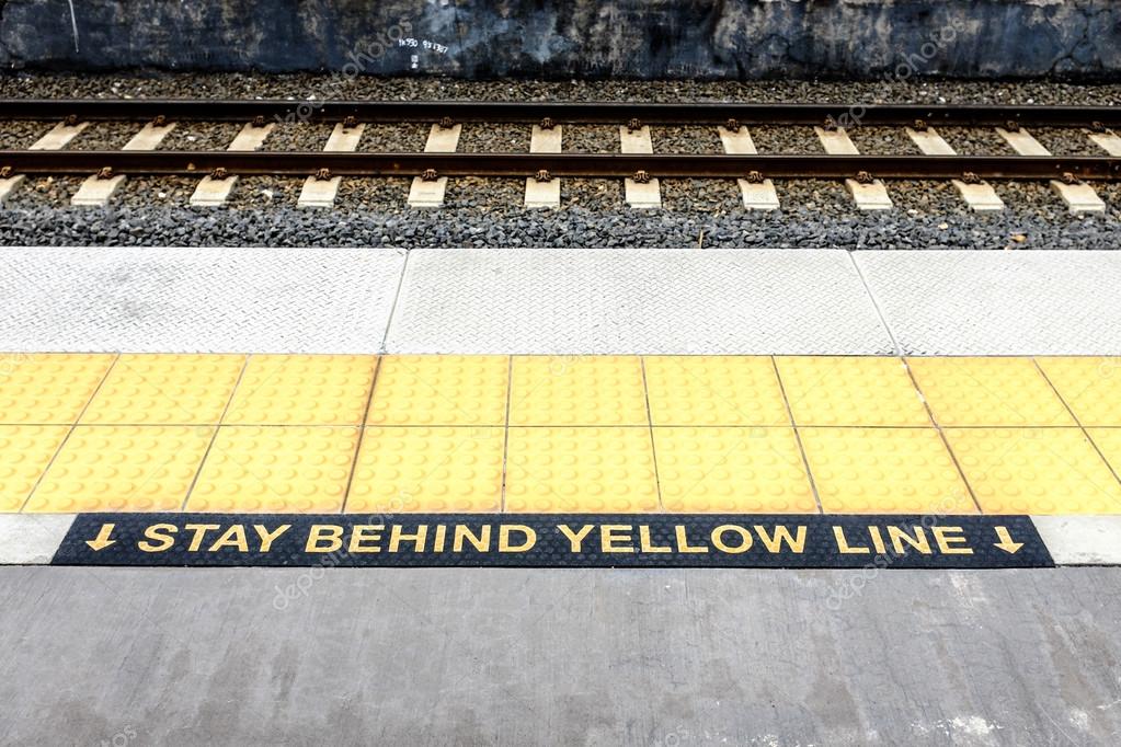Warning Sign Stay Behind the Yellow Line — Stock Photo © silkenphotos ...