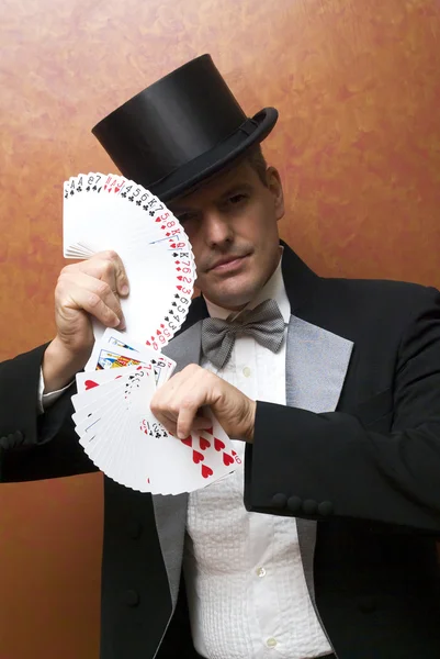 Magician with cards Stock Photo by ©-Robbie- 23542501