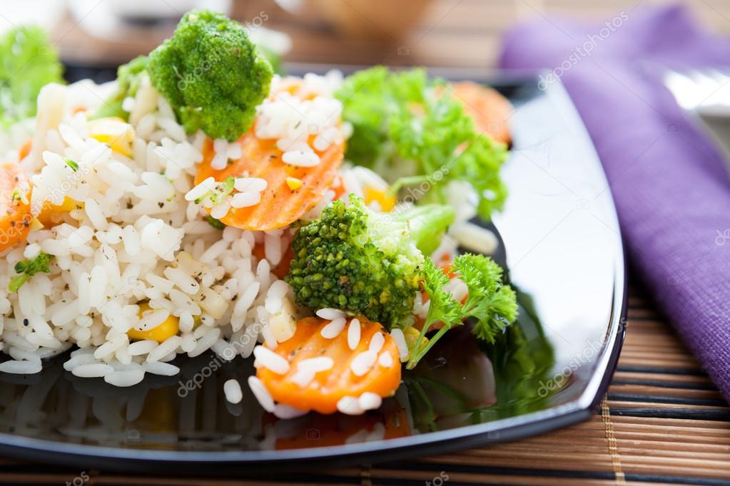 Rice with roasted carrots and broccoli Stock Photo by ©olhaafanasieva ...
