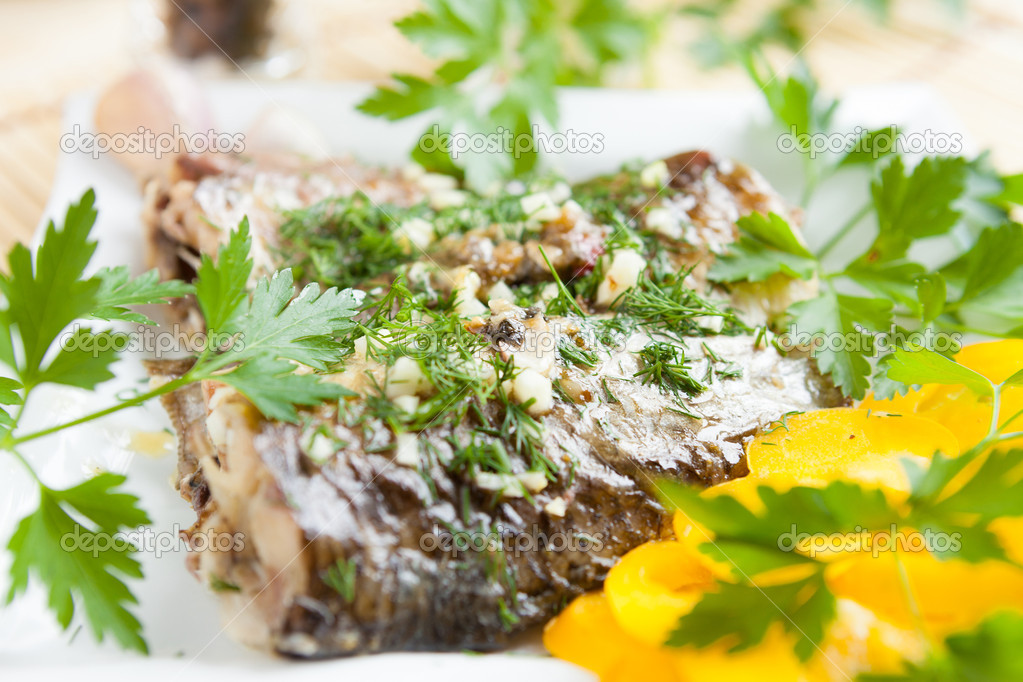 Roast river fish with sauce and fresh vegetables Stock Photo by ...