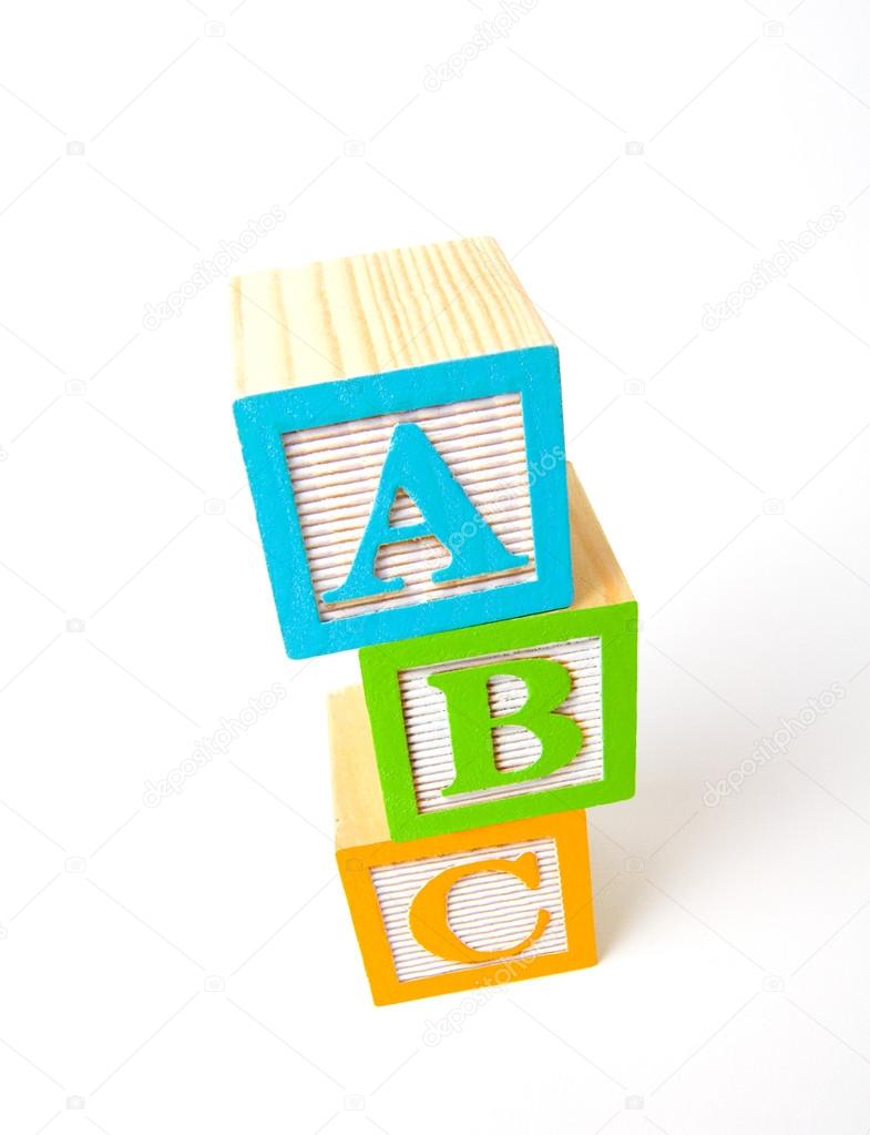 Wooden ABC blocks Stock Photo by ©vividpixels 19043575