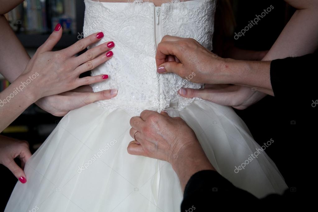 Dressing the bride — Stock Photo © lfmpereira1 #29846139
