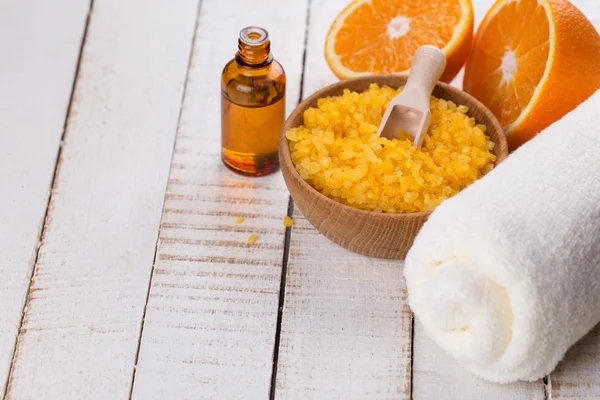 Sea salt in bowl with oranges - Stock Image - Everypixel