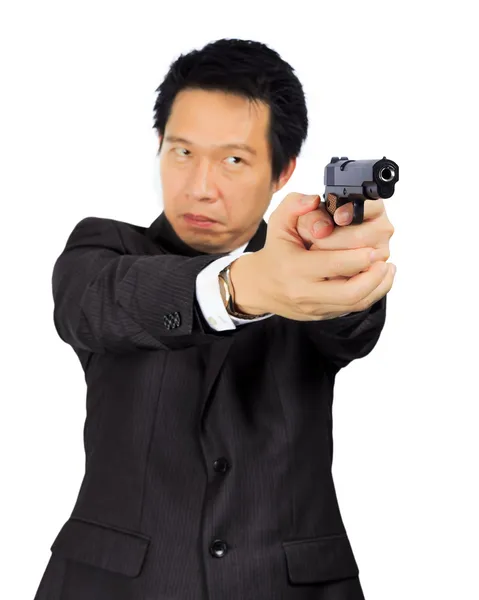 Asian male with a gun on white Stock Photo by ©cowardlion 32858867