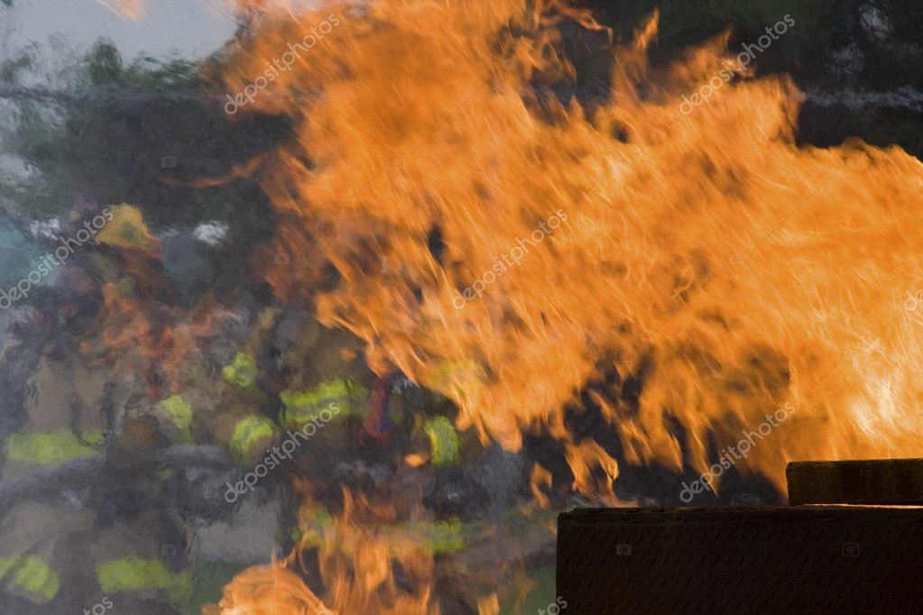 Firefighters putting out a fire Stock Photo by ©jbryson 21357413