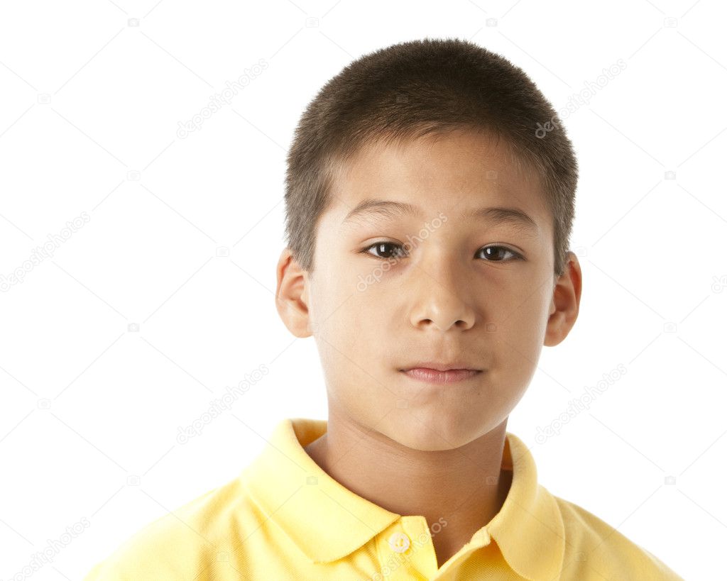 Hispanic boy with a serious expression Stock Photo by ©jbryson 21362009