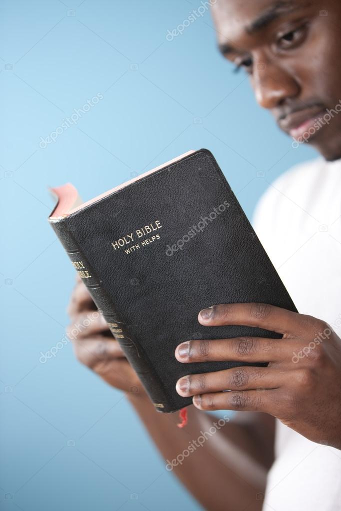 Young Man Reading Bible