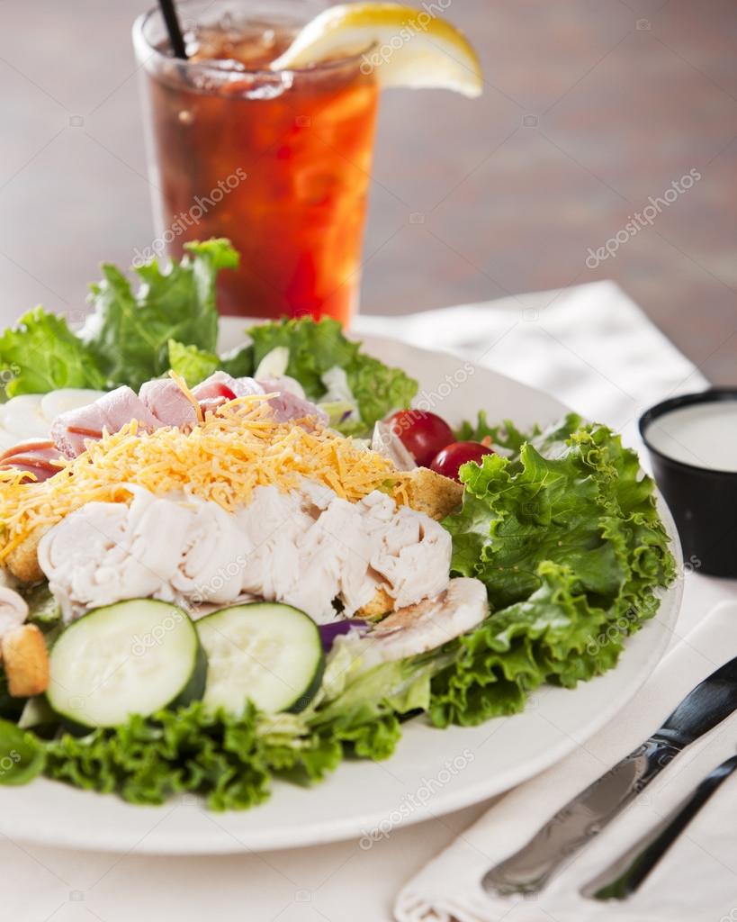 Food and Drink. Chef salad with a refreshing glass of iced tea — Stock ...