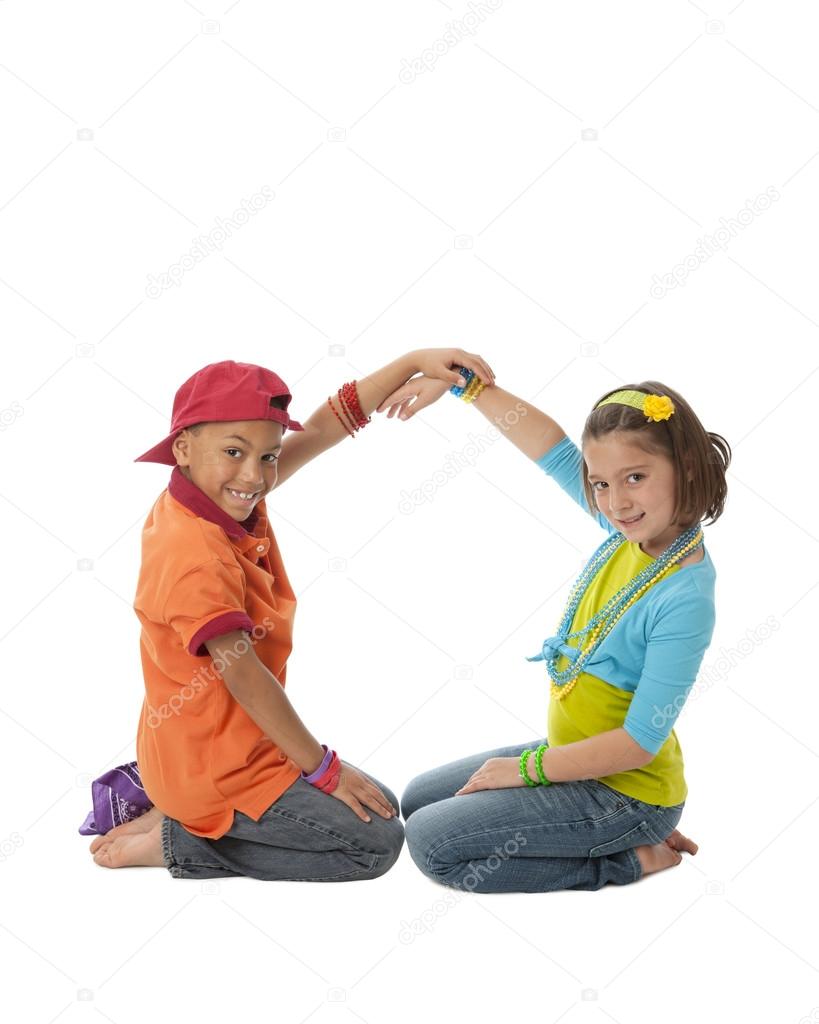 Human Alphabet. Diverse children work together to form the letter O ...