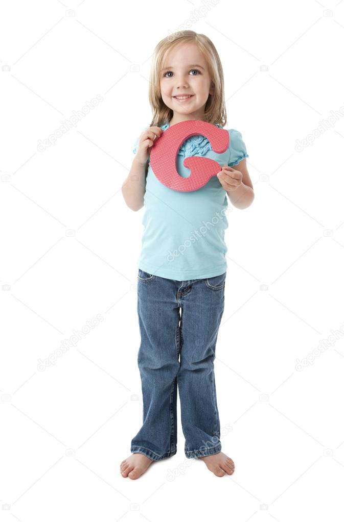 Human Alphabet. Caucasian young girl holds Letter G Stock Photo by ...