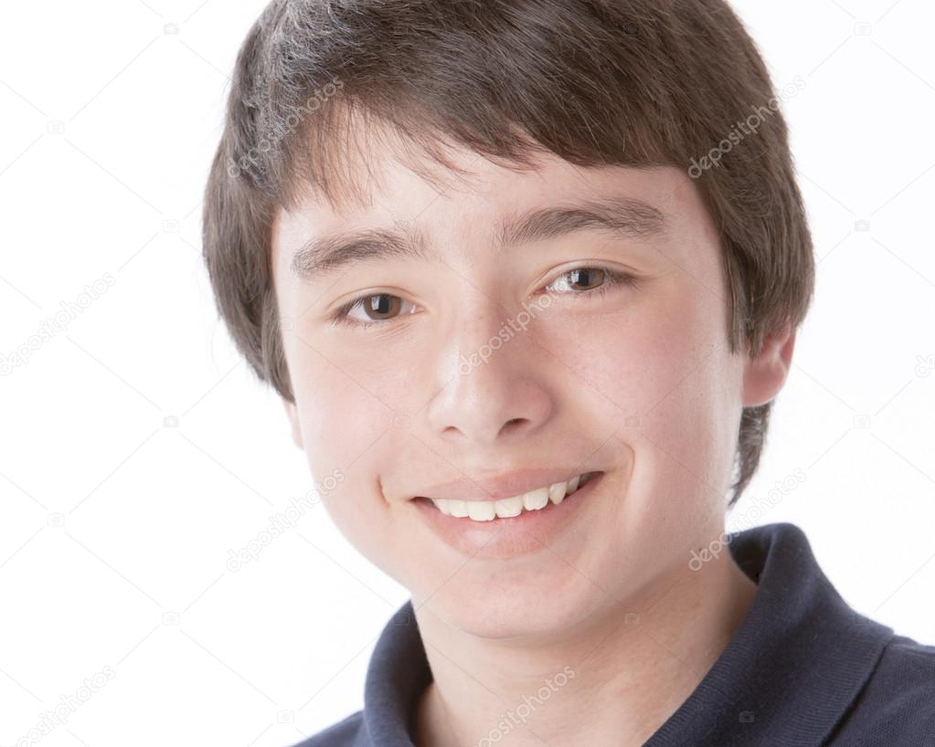 A closeup headshot of a 12 year old caucasian smiling little real boy ...