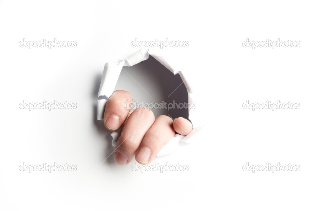 Hand showing trough a hole of a white paper Stock Photo by ©scornejor ...