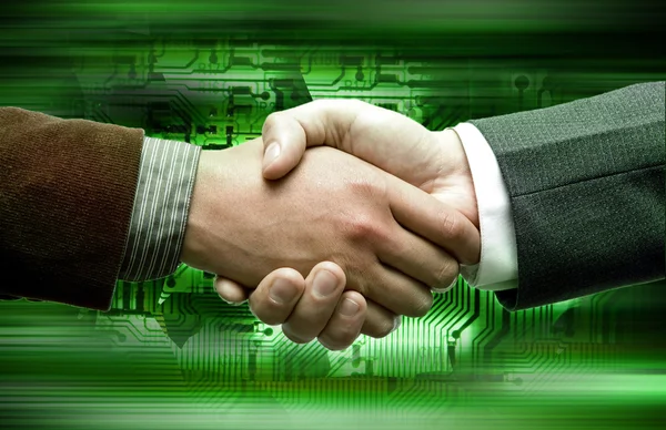 Business handshake on technology background Stock Photo by ©scornejor ...