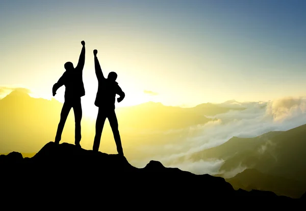 Two men on rock - Stock Image - Everypixel