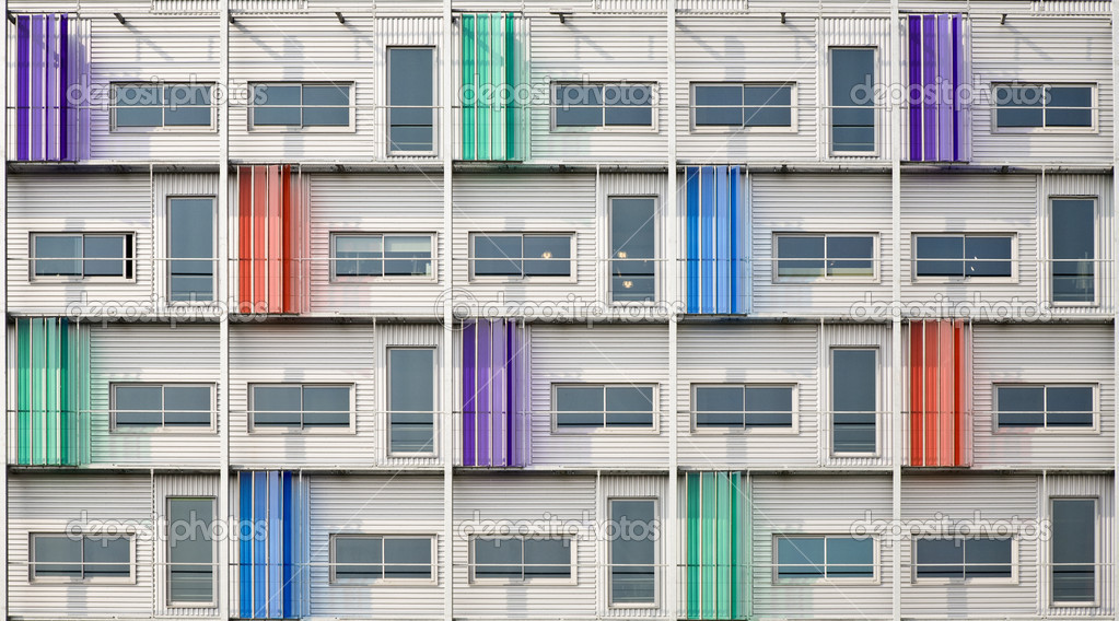 Multi colored facade of a modern building — Stock Photo © erikdegraaf ...