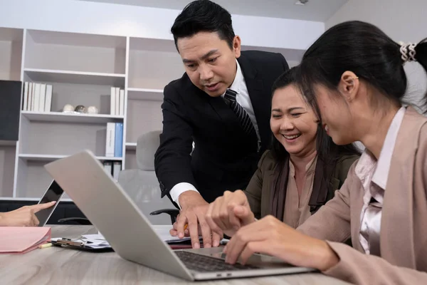 Boss standing presentation about work and brainstrom with colleagues in ...