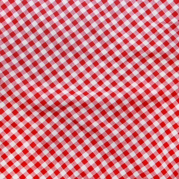 Red linen crumpled tablecloth. - Stock Image - Everypixel