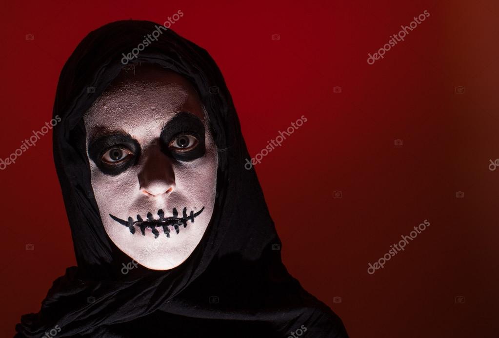 Scary skull woman red background Stock Photo by ©gabriel11 33833705
