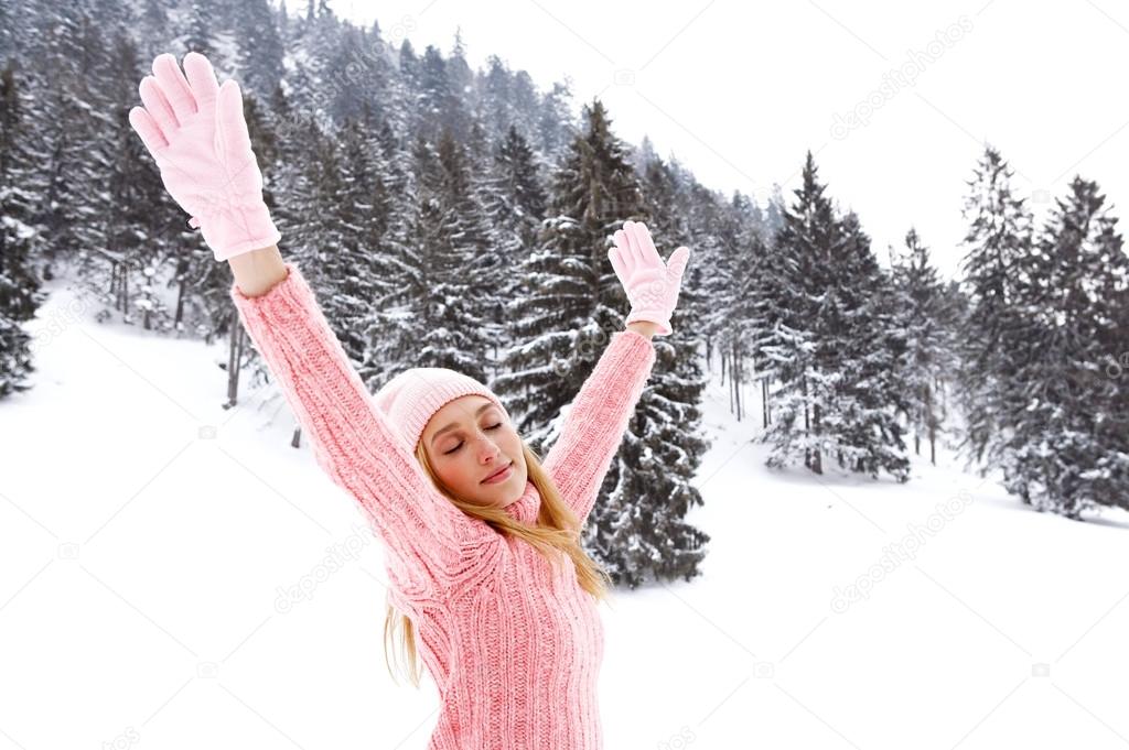 Woman in snowed mountains Stock Photo by ©mjth 42539877
