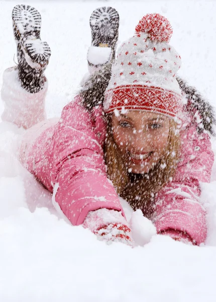 Young woman falling down in the snow - Stock Image - Everypixel